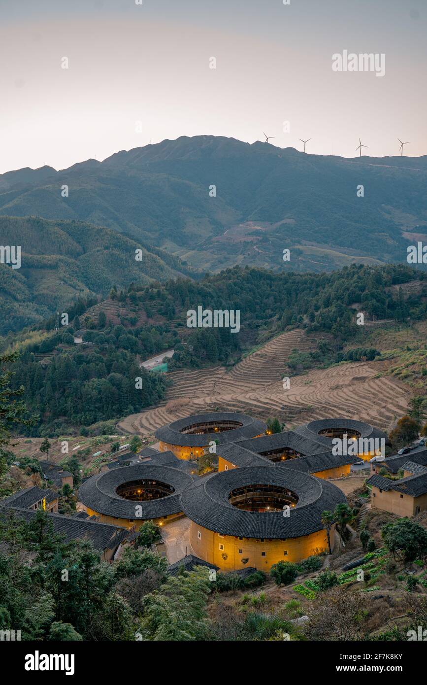 Night view of a Tulou, a traditional Chinese architecture in Fujian ...