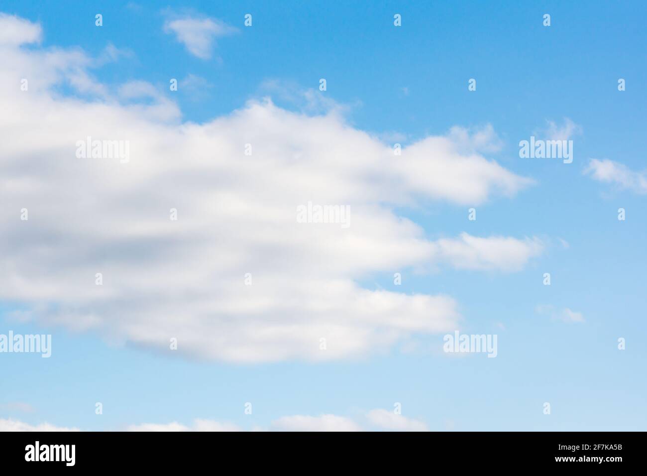 blue sky with flying white light clouds Stock Photo - Alamy
