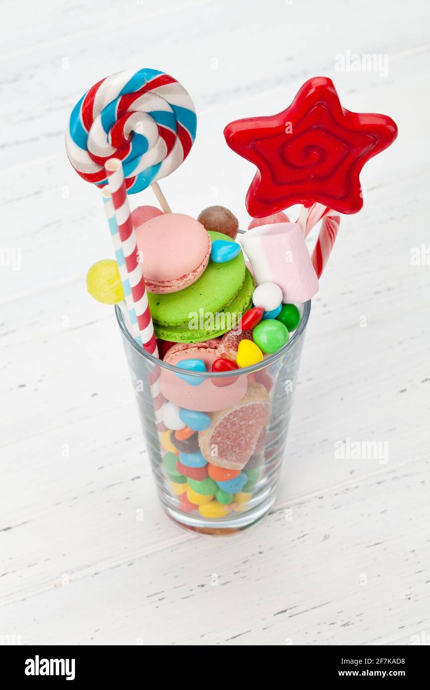 Various sweets assortment. Candy, bonbon, chocolate and macaroons in ...