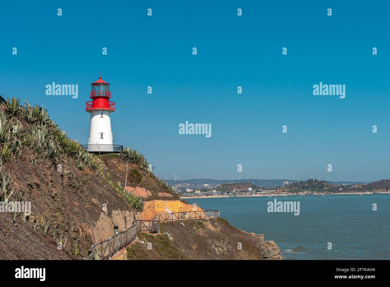 A lighthouse at the cliff along the sea, in Fujian province, China ...