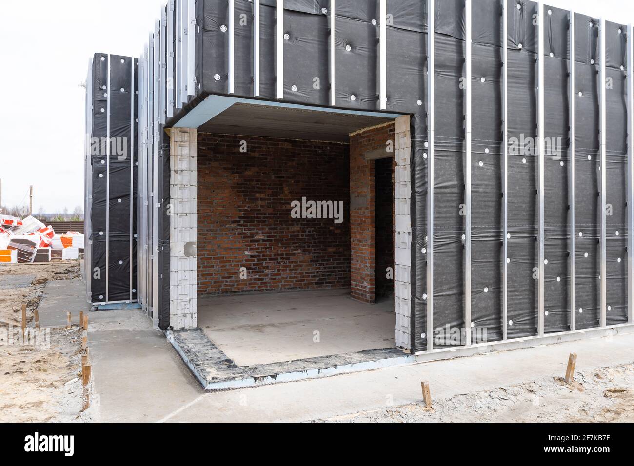 Building Construction Site in progress to new house Stock Photo - Alamy