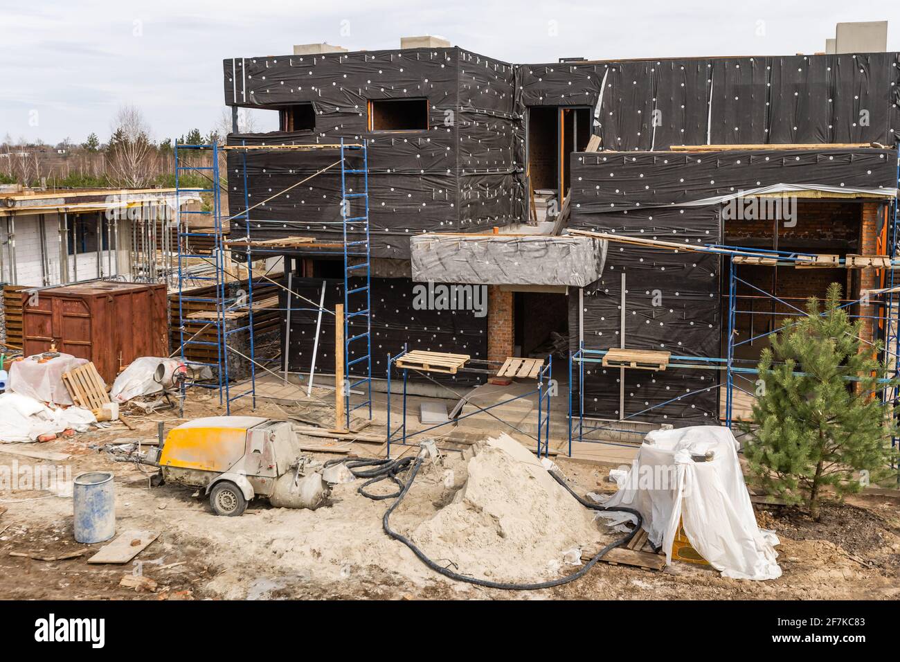 Building Construction Site in progress to new house Stock Photo - Alamy