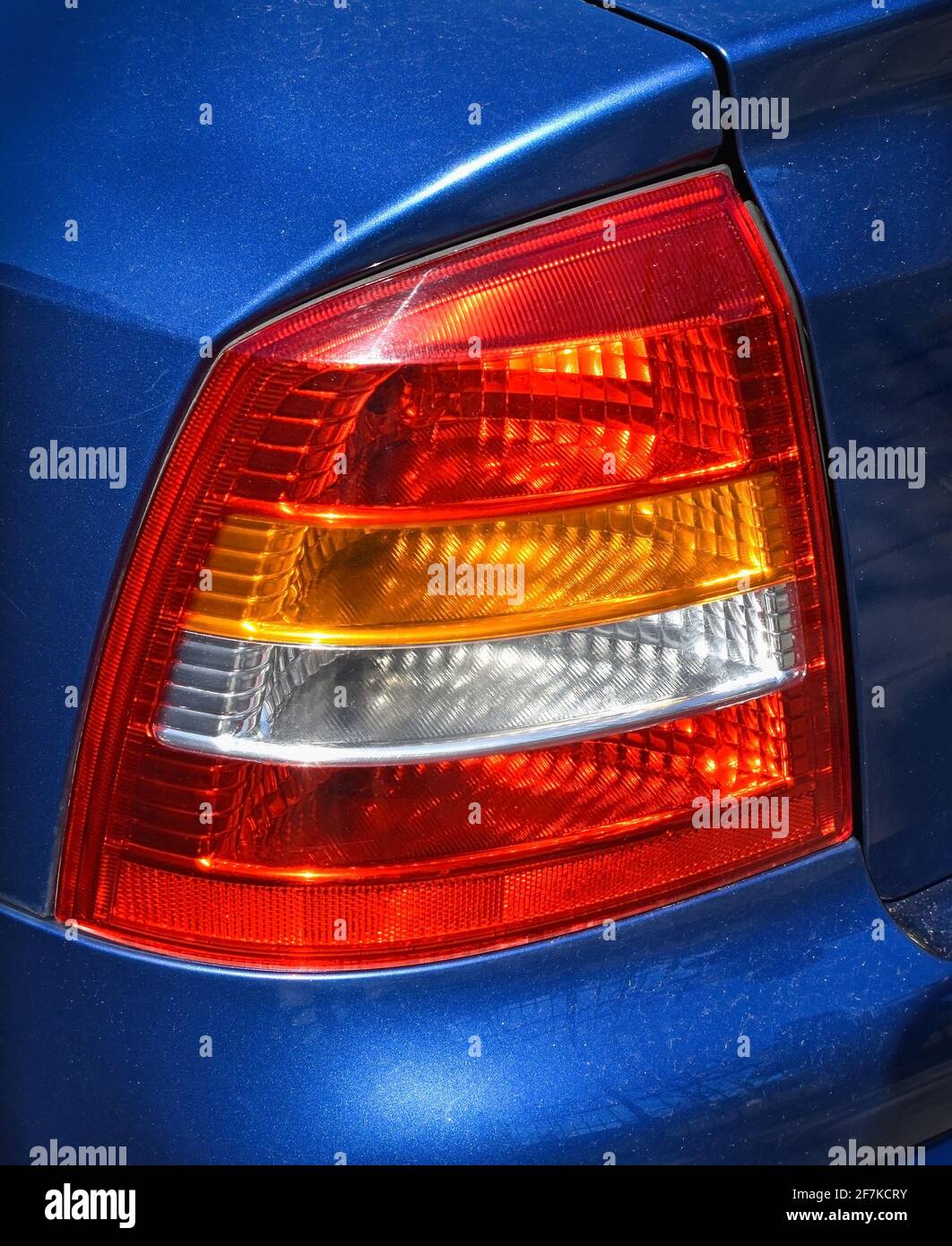 Tail light of a blue car Stock Photo - Alamy