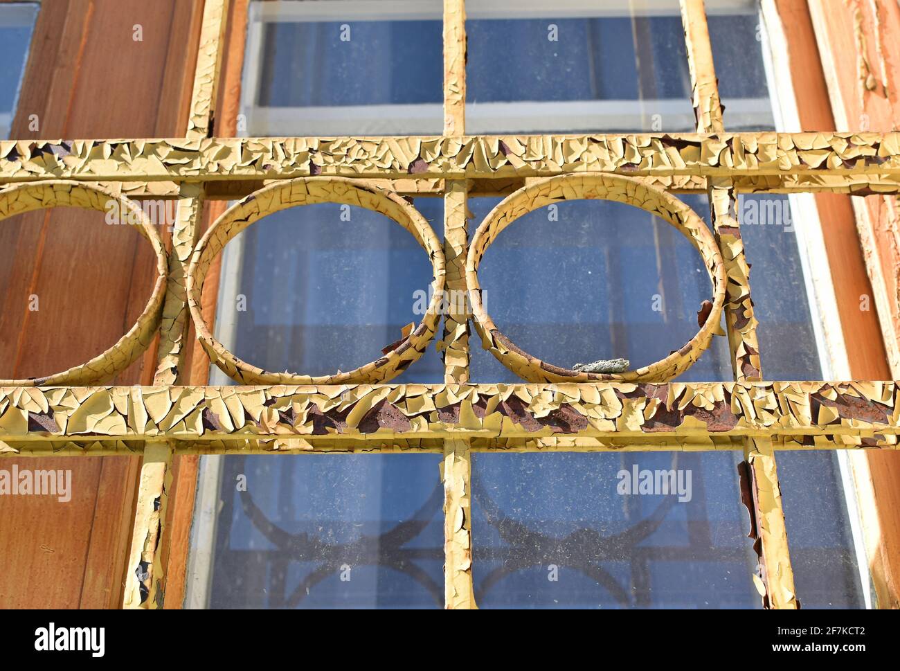 Protective metal grid in front of a window Stock Photo - Alamy