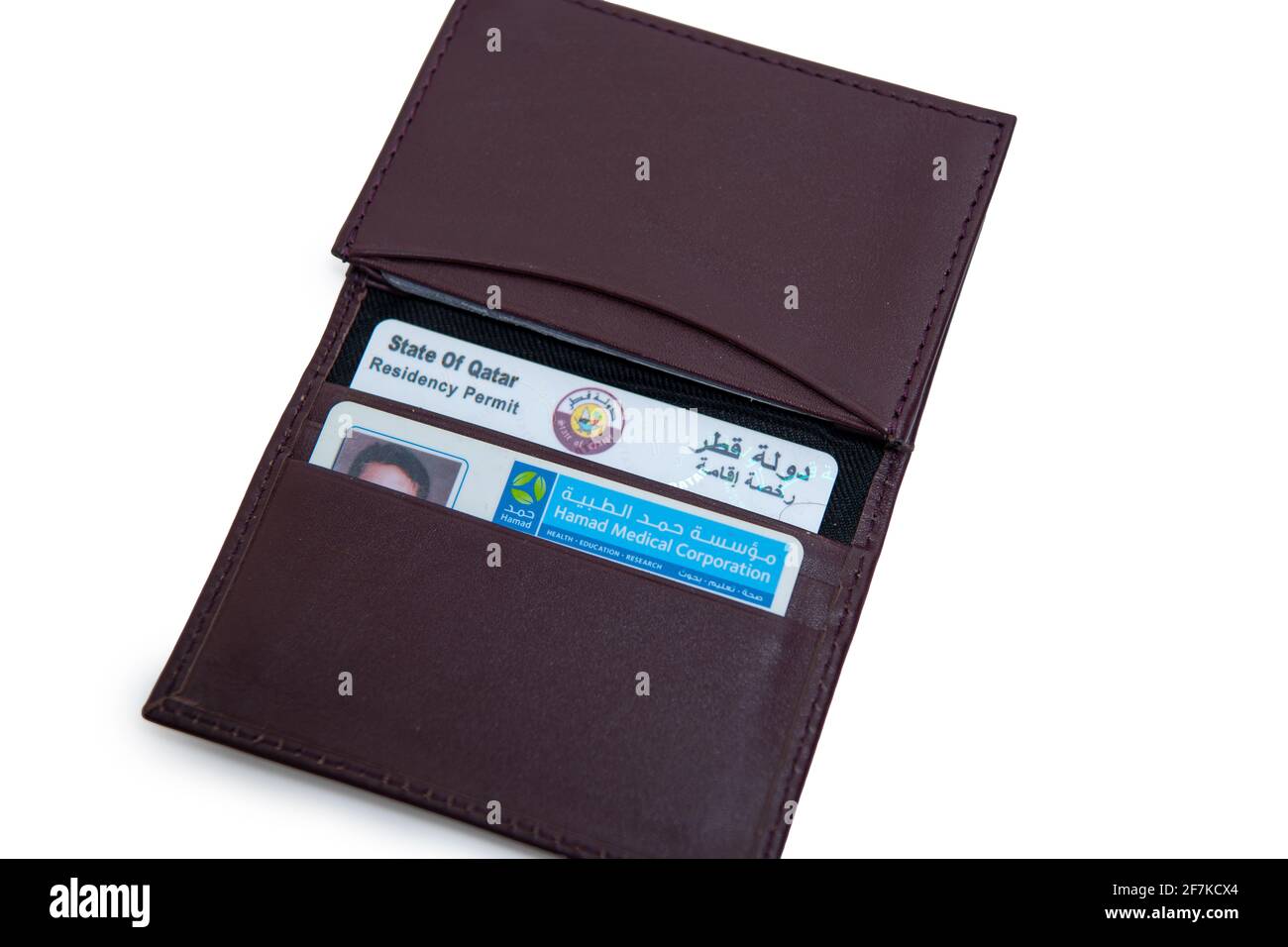 Qatari ID Card and Health Hard in Leather Valet on Isolated Background ...