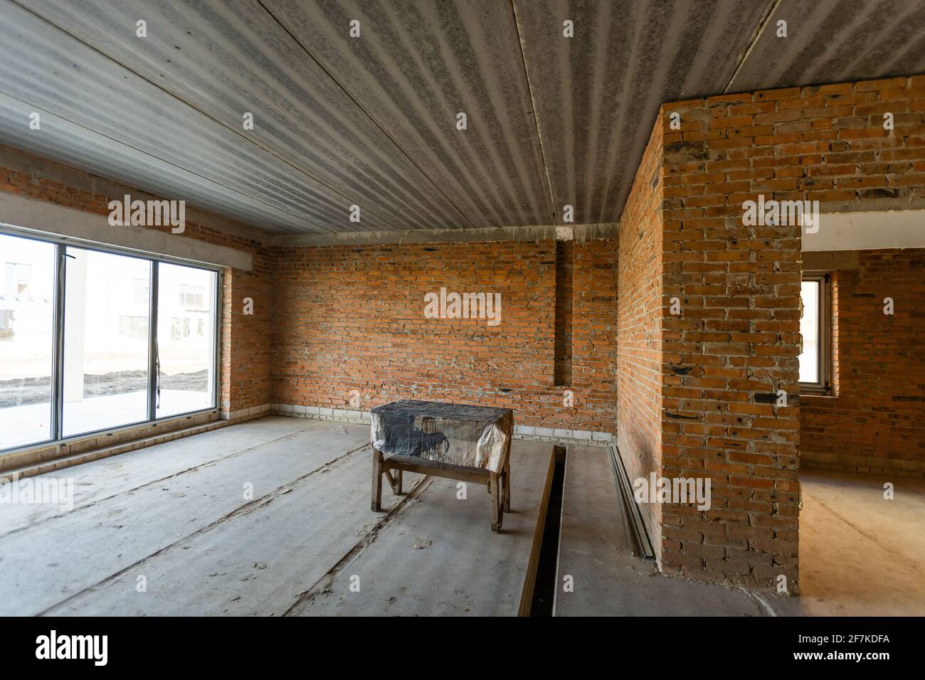Interior construction of housing project patched without painting ...