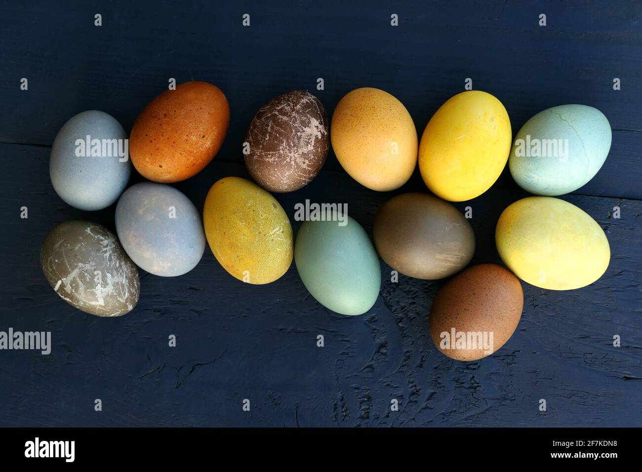 Easter eggs colorful collection on wooden background. Natural coloring ...