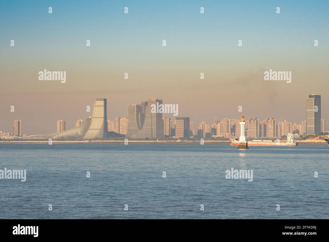 The port in Xiamen, Fujian province, China, on a sunny day, sunrise ...