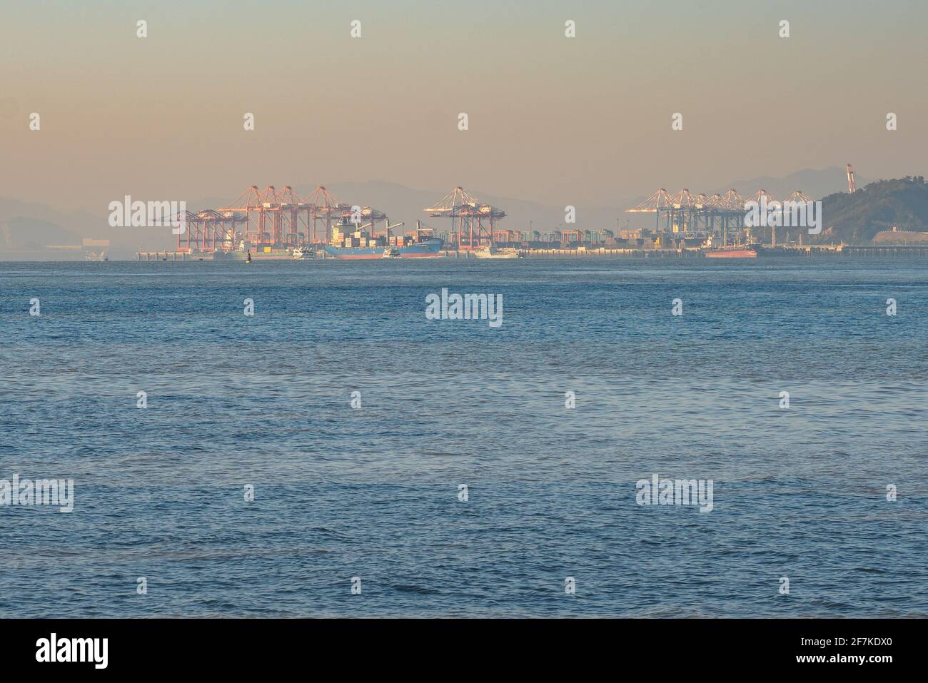 The port in Xiamen, Fujian province, China, on a sunny day, sunrise ...