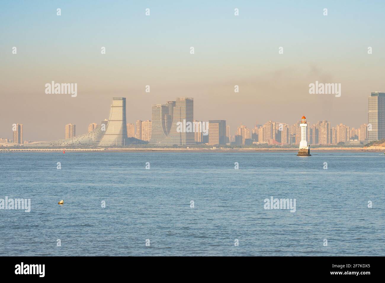 The port in Xiamen, Fujian province, China, on a sunny day, sunrise ...