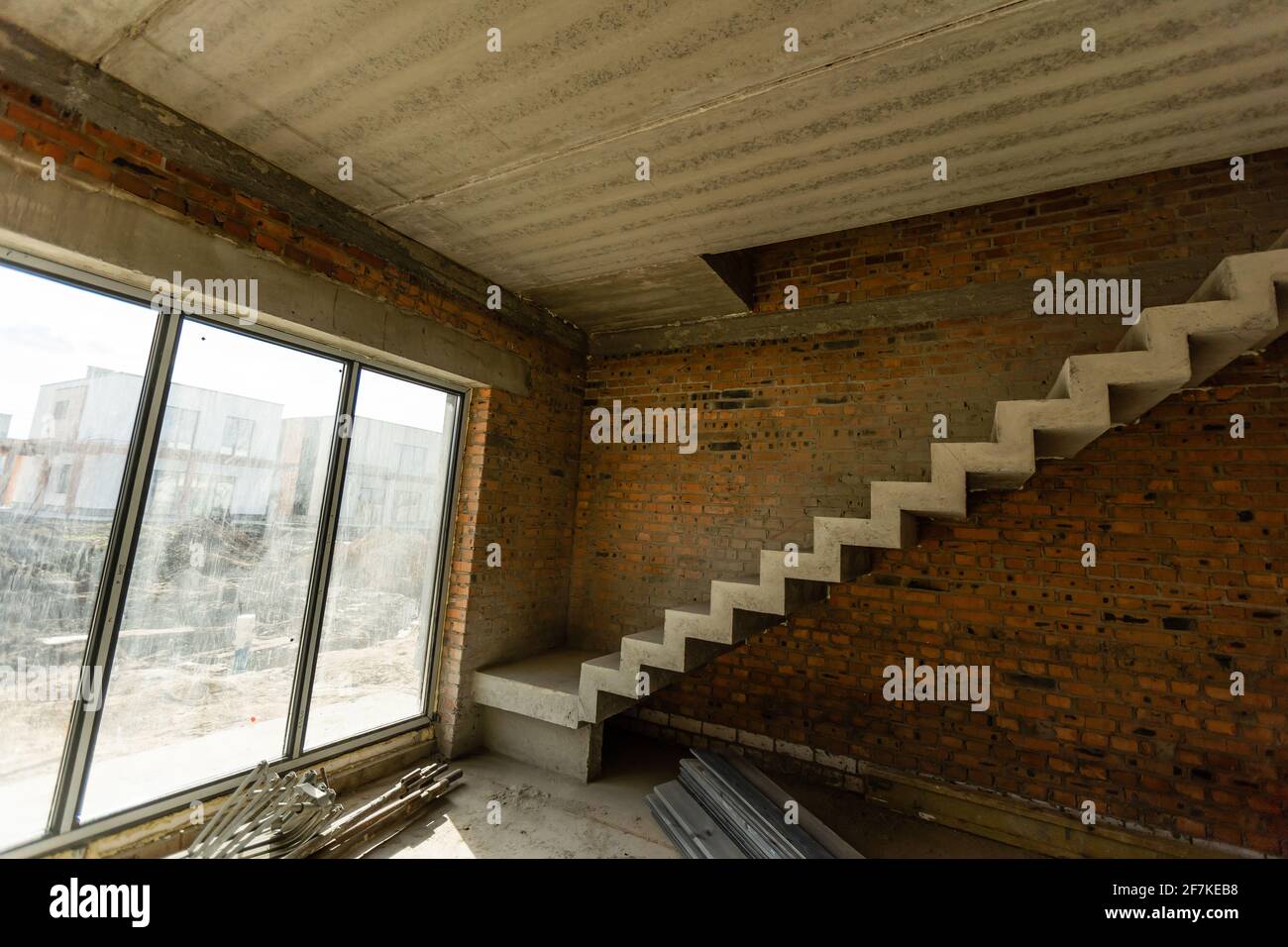 Interior construction of housing project patched without painting ...