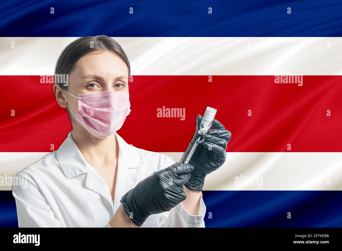Girl doctor prepares vaccination against the background of the Costa ...