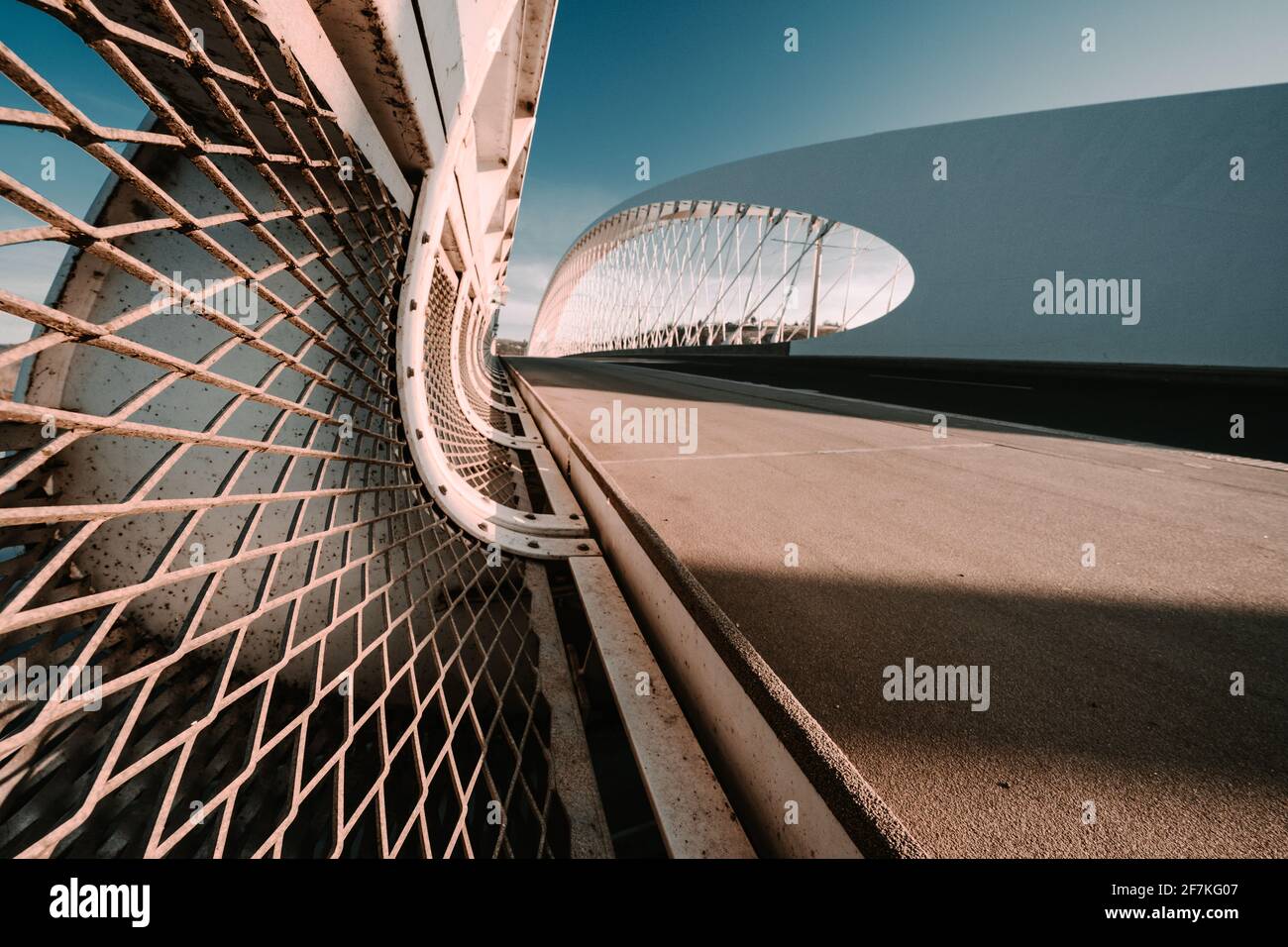 Modern white bridge - ultra wide angle during sunrise Stock Photo - Alamy