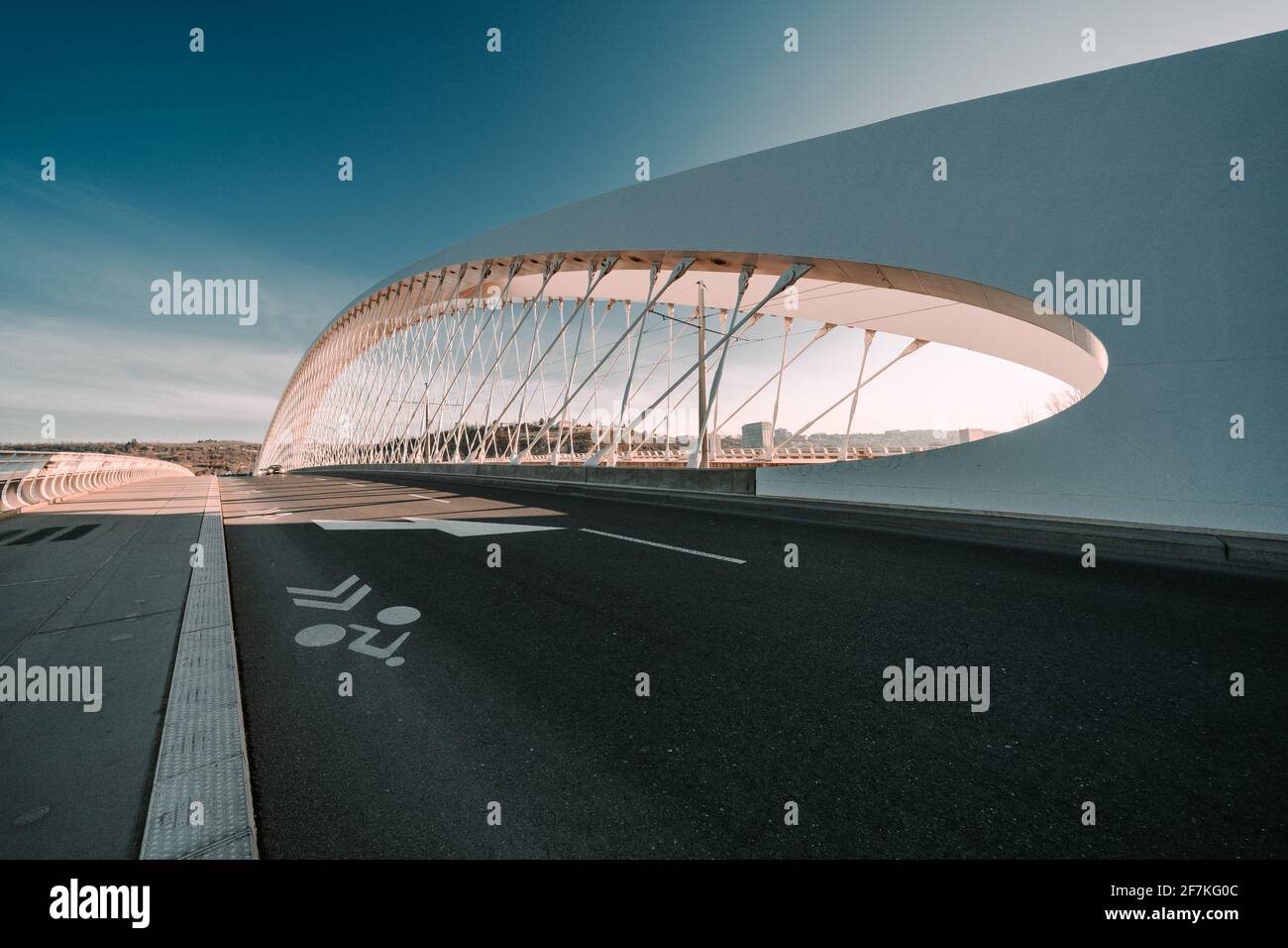 Modern white bridge - ultra wide angle during sunrise Stock Photo - Alamy
