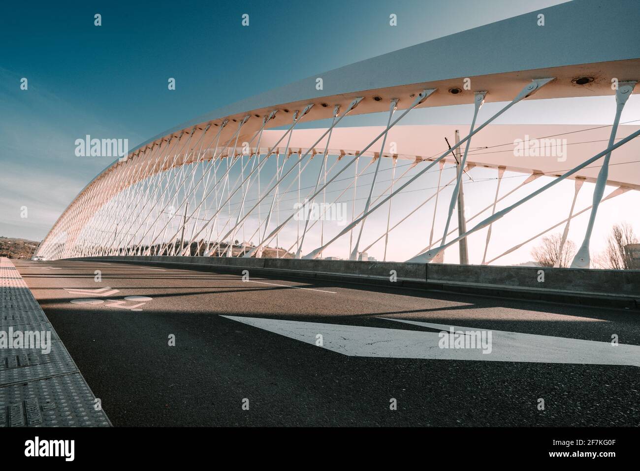 Modern white bridge - ultra wide angle during sunrise Stock Photo - Alamy