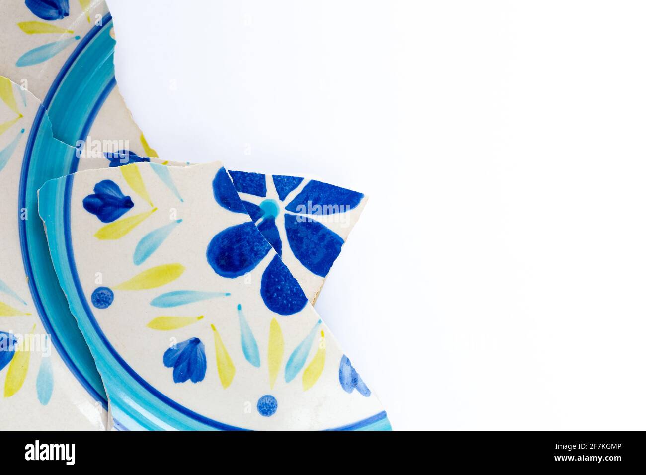 Broken ceramic plate on white background. Made in natural light Stock ...