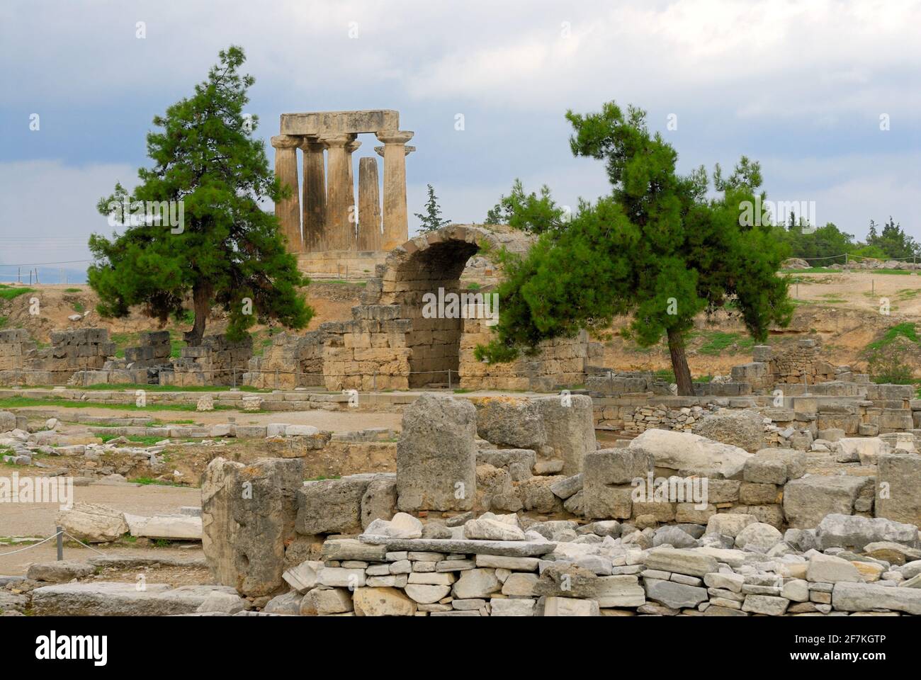 ruins of ancient Corinth, temple of Apollo, other ruins in front ...