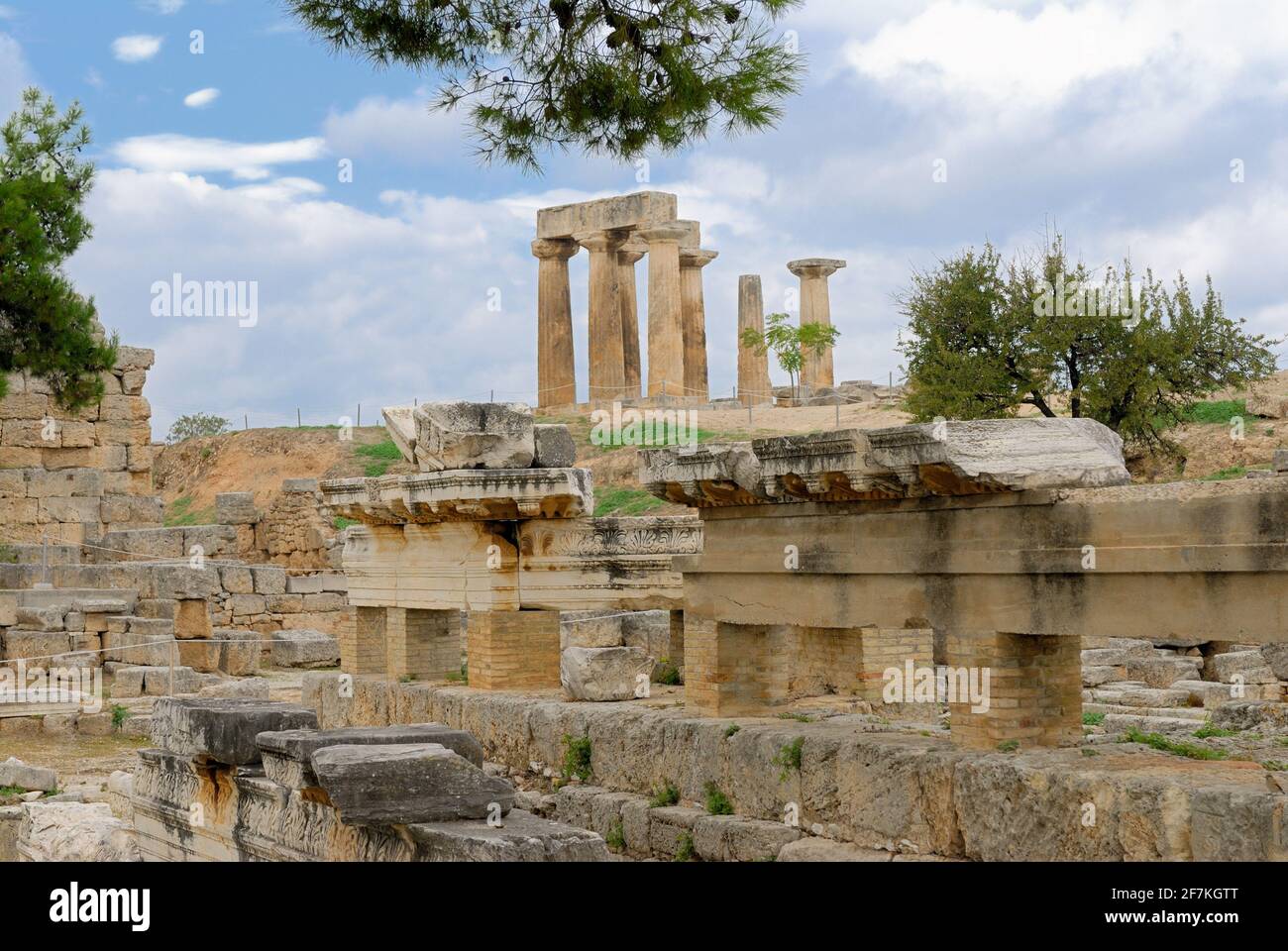 ruins of ancient Corinth, temple of Apollo, other ruins in front ...