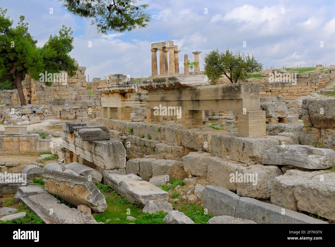 ruins of ancient Corinth, temple of Apollo, other ruins in front ...