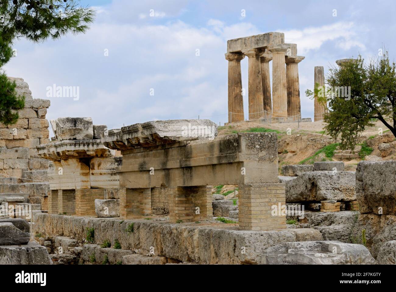ruins of ancient Corinth, temple of Apollo, other ruins in front ...