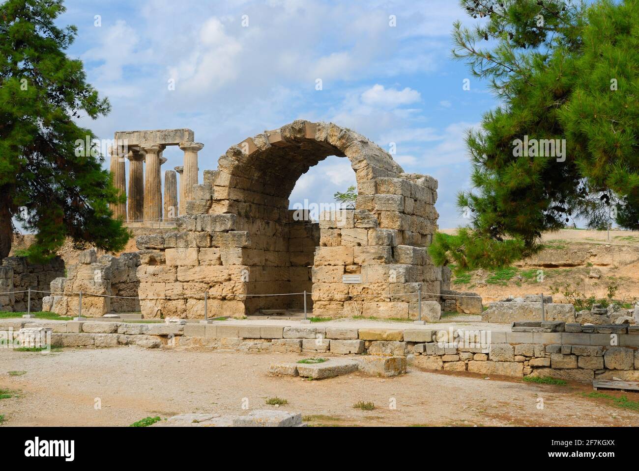 ruins of ancient Corinth, temple of Apollo behind, other ruins in front ...