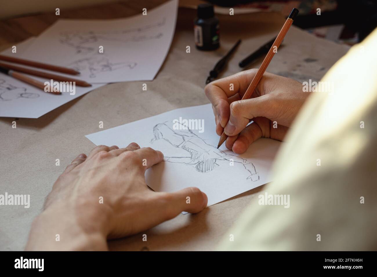 Artist drawing figure pencil sketches. Artwork background Stock Photo ...