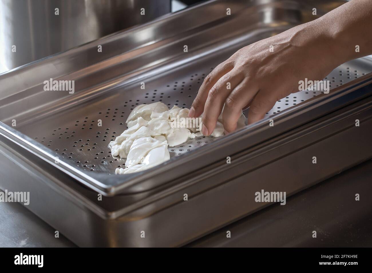 The process of creating fresh mozzarella cheese Stock Photo - Alamy