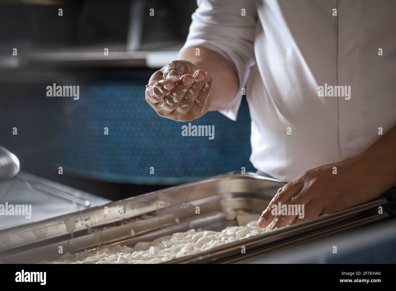 The process of creating fresh mozzarella cheese Stock Photo - Alamy