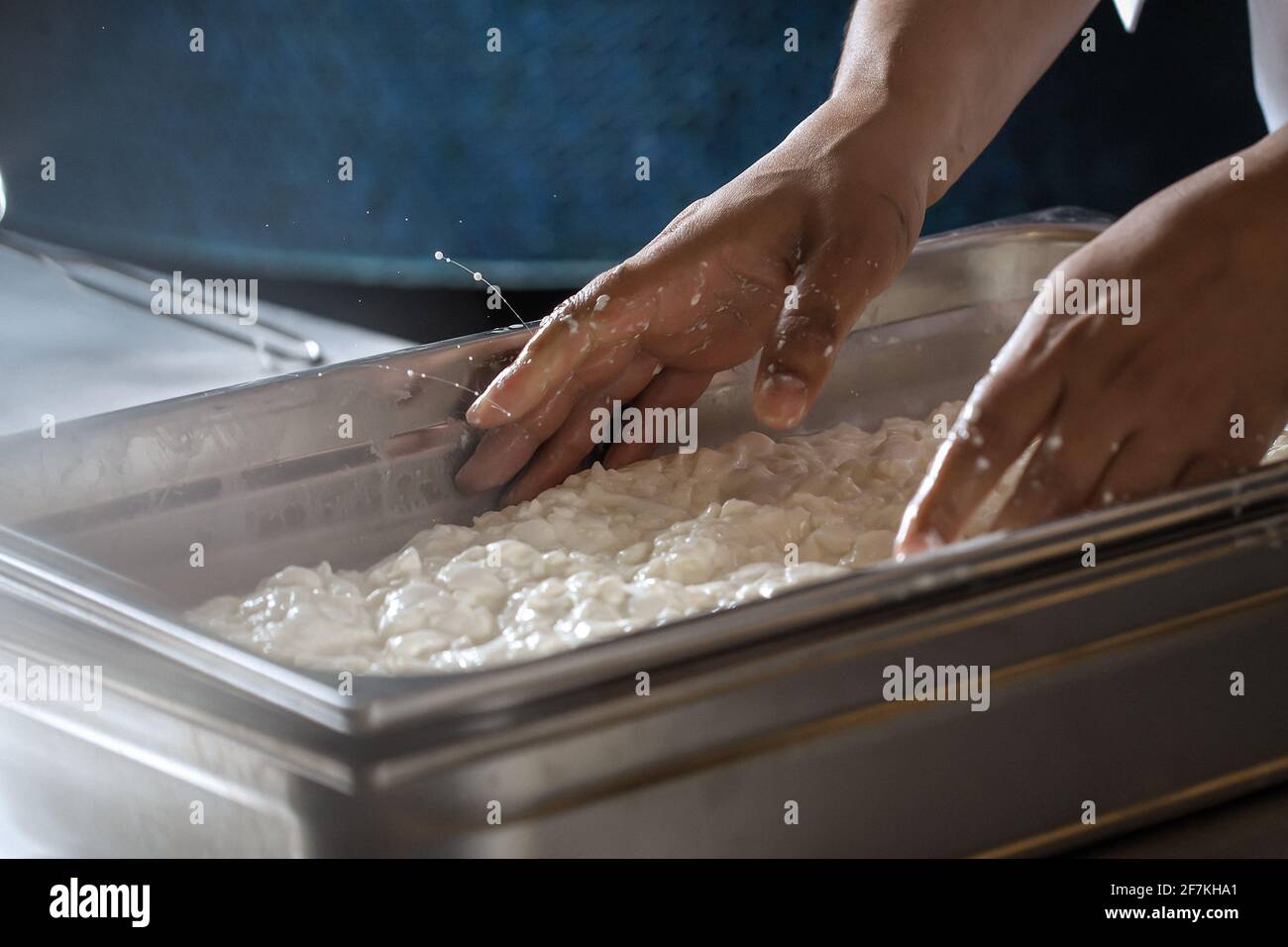 The process of creating fresh mozzarella cheese Stock Photo - Alamy