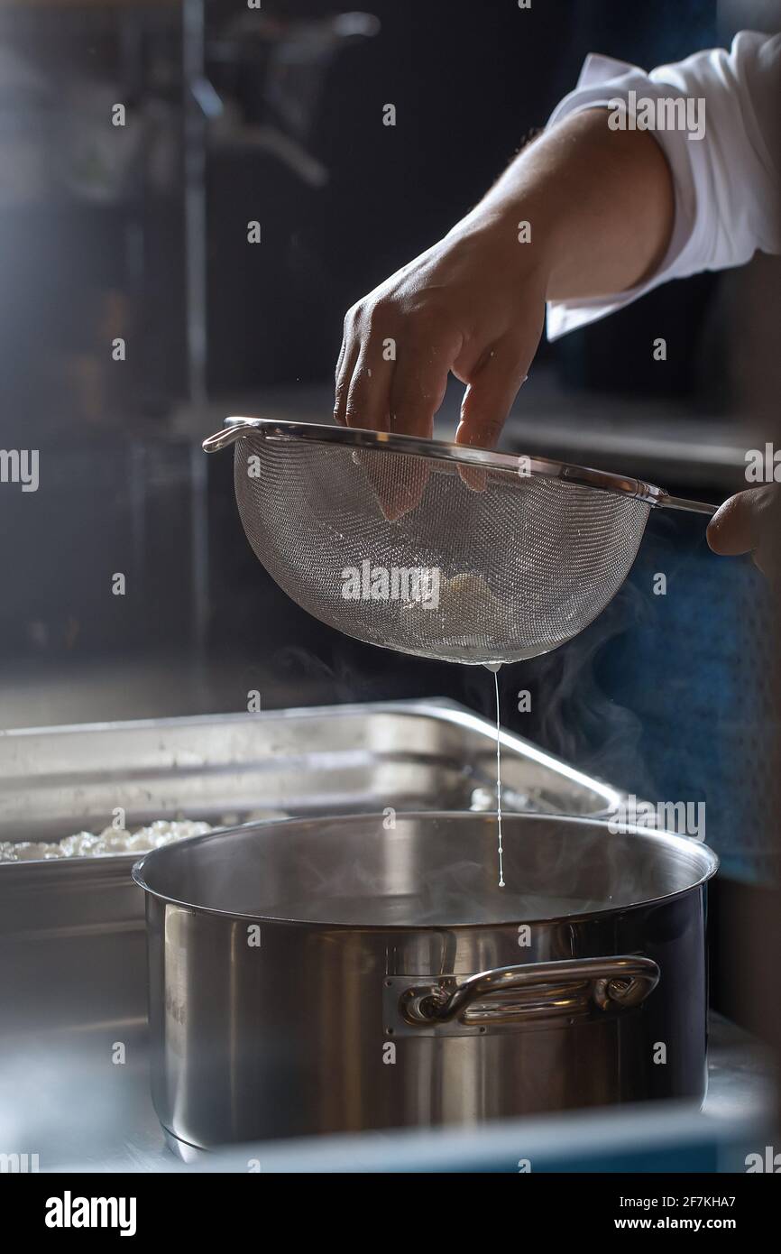 The process of creating fresh mozzarella cheese Stock Photo - Alamy