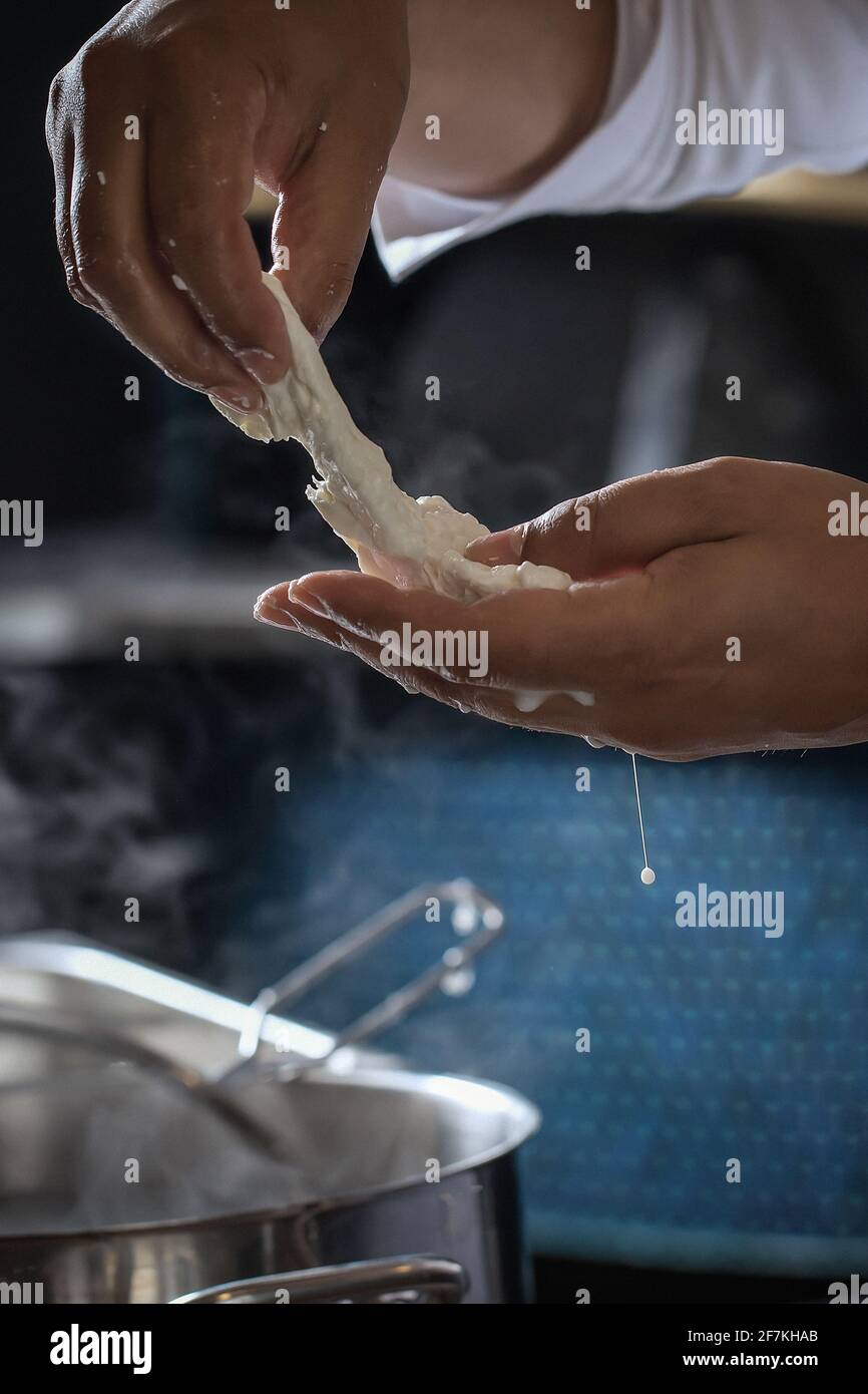 The process of creating fresh mozzarella cheese Stock Photo - Alamy
