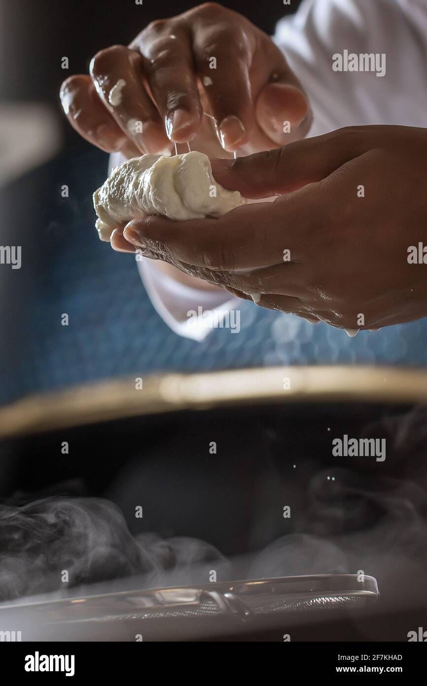The process of creating fresh mozzarella cheese Stock Photo - Alamy