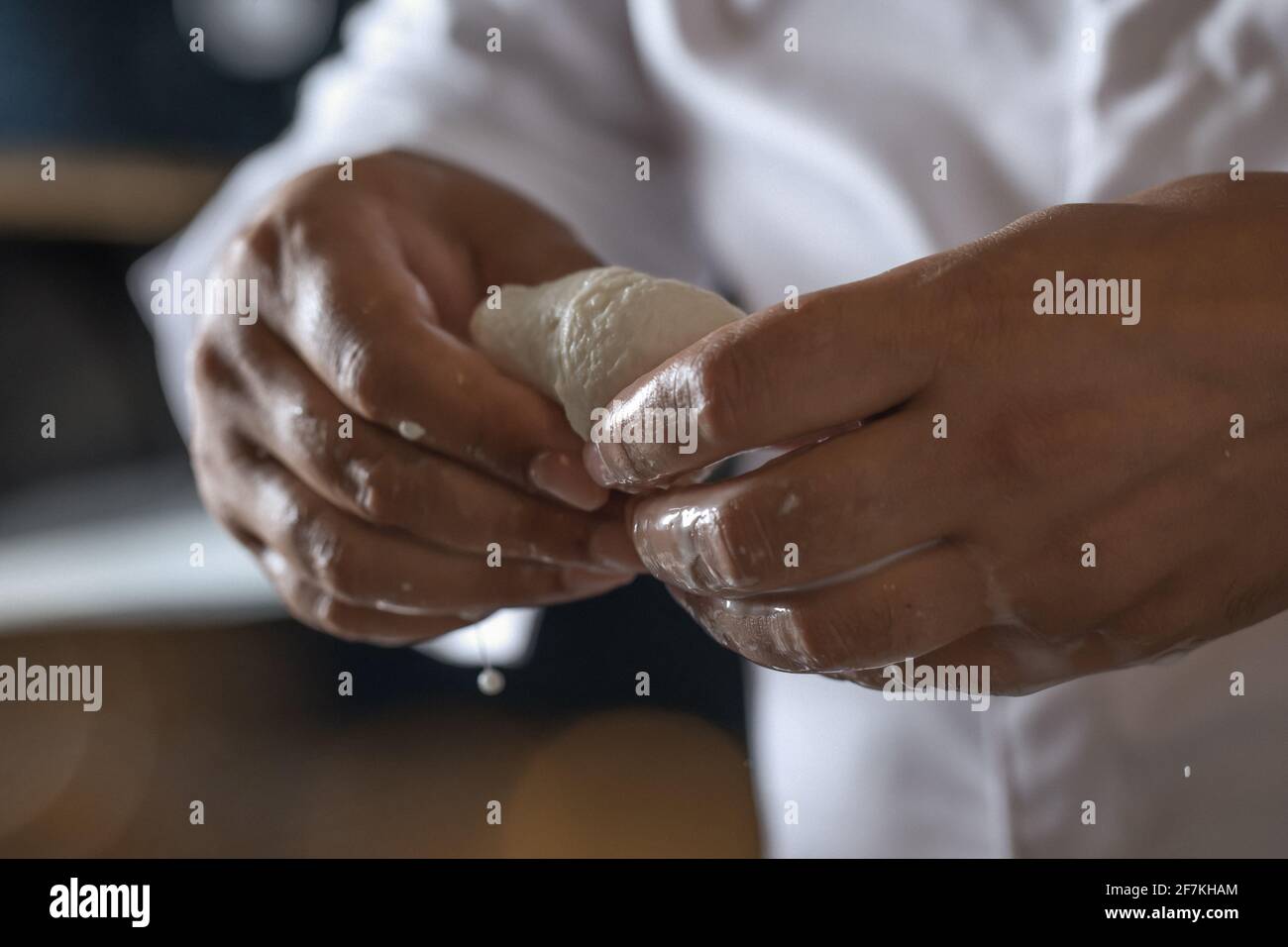 The process of creating fresh mozzarella cheese Stock Photo - Alamy