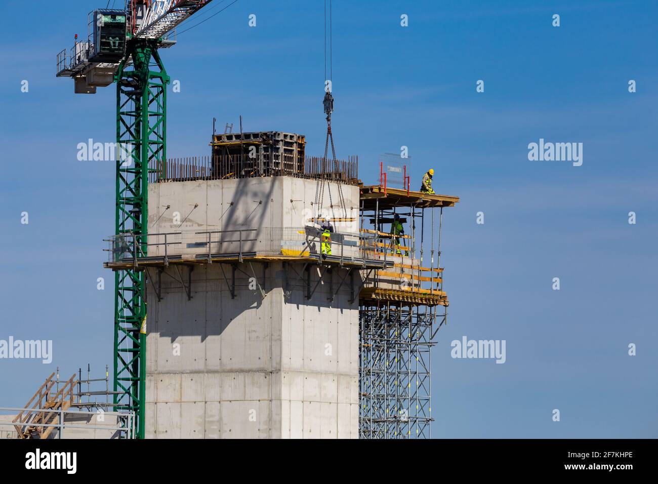 Workers working at height on the construction of a public facility ...