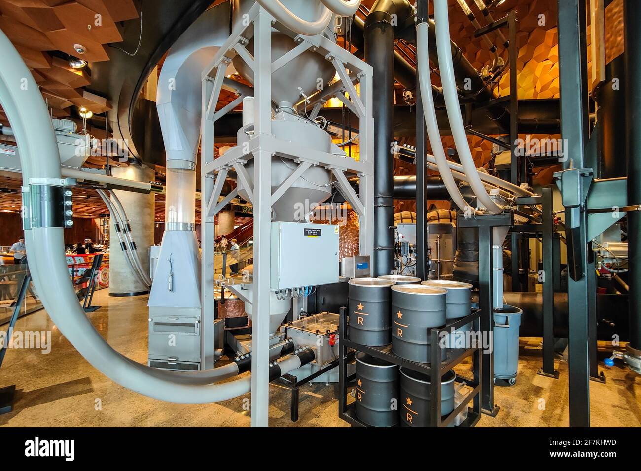 SHANGHAI, CHINA - APRIL 8, 2021 - Staff members work in front of huge ...