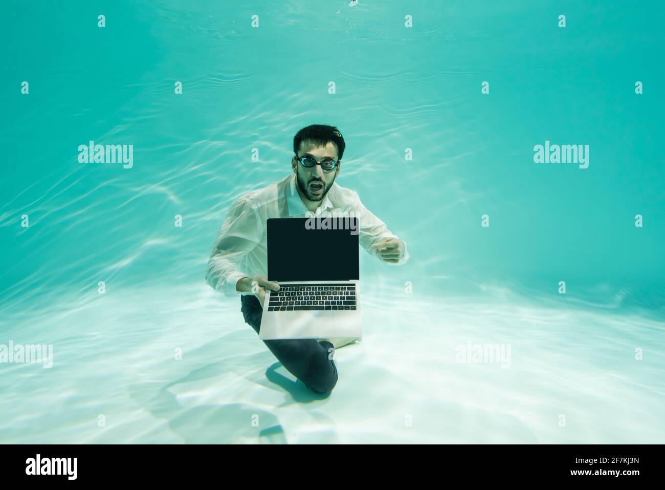 Man diving laptop computer hi-res stock photography and images - Alamy