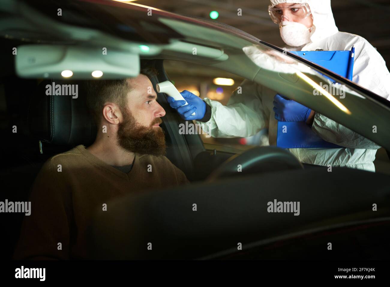 Body temperature checking hi-res stock photography and images - Alamy