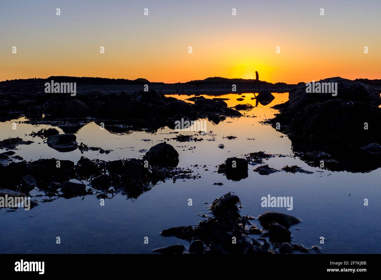 A gorgeous sunset at Rhosneigr, Anglesey, North Wales, UK Stock Photo ...