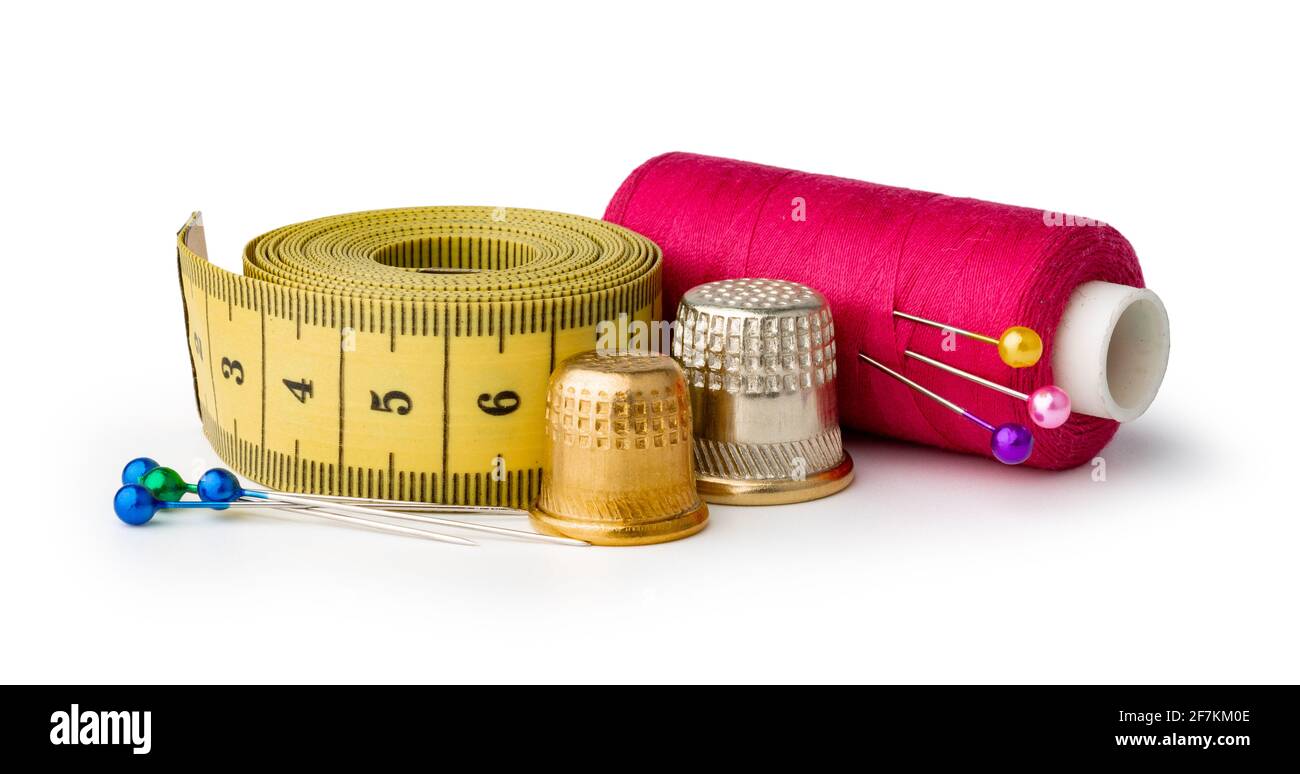 Tailor, needles and threads over white background Stock Photo - Alamy