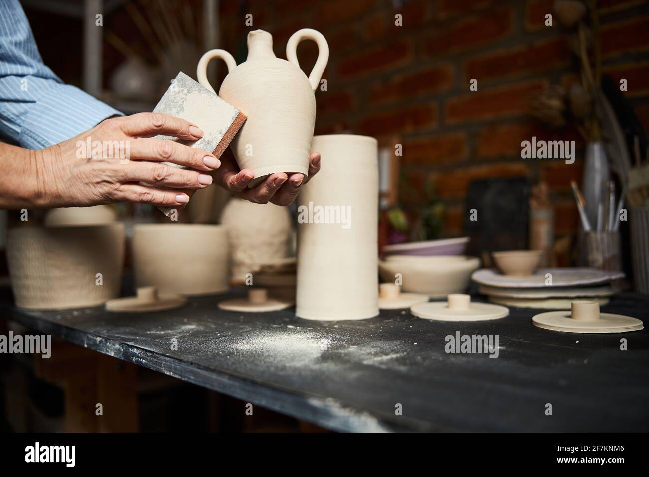 Grinding clay for pottery hi-res stock photography and images - Alamy