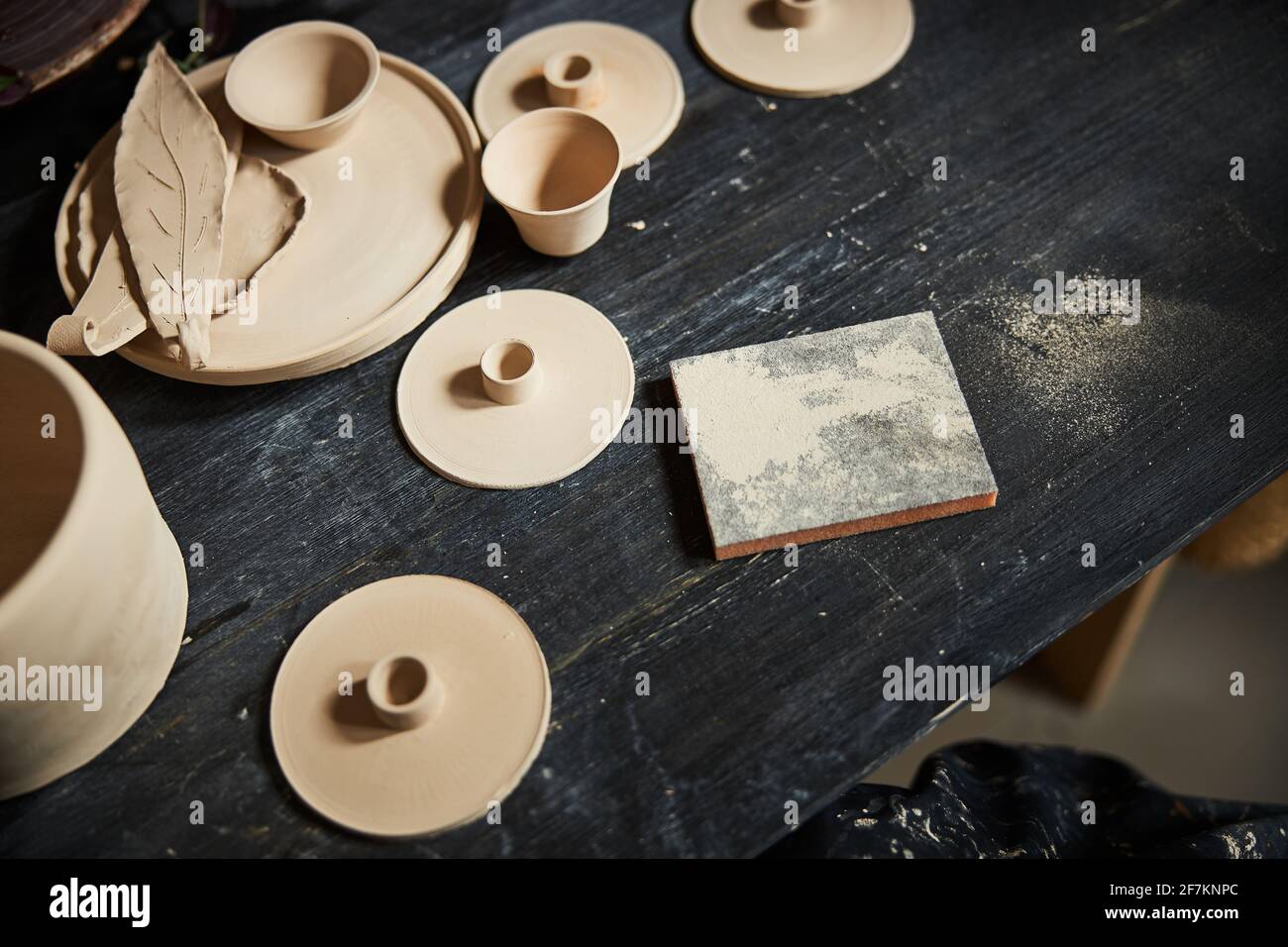 Grinding clay for pottery hi-res stock photography and images - Alamy