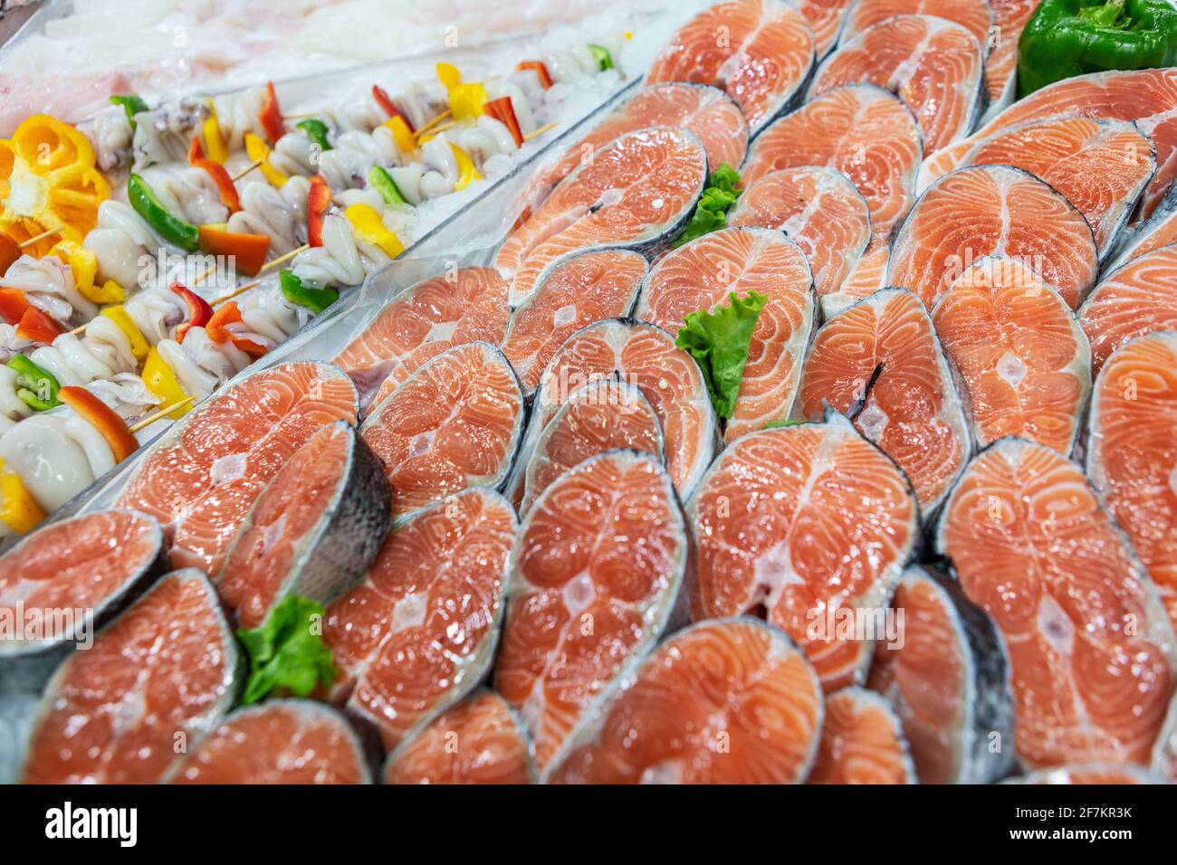 supermarket fishmonger with fresh fish Stock Photo - Alamy