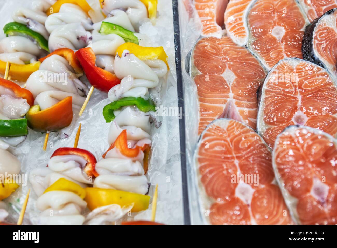 supermarket fishmonger with fresh fish Stock Photo - Alamy