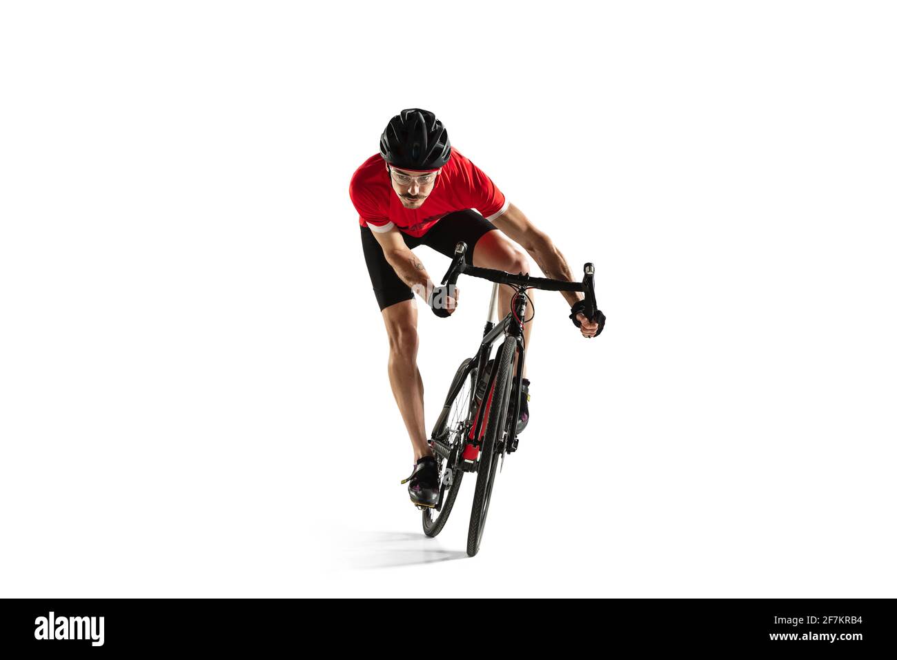 Professional male bike rider on road bike isolated over white ...