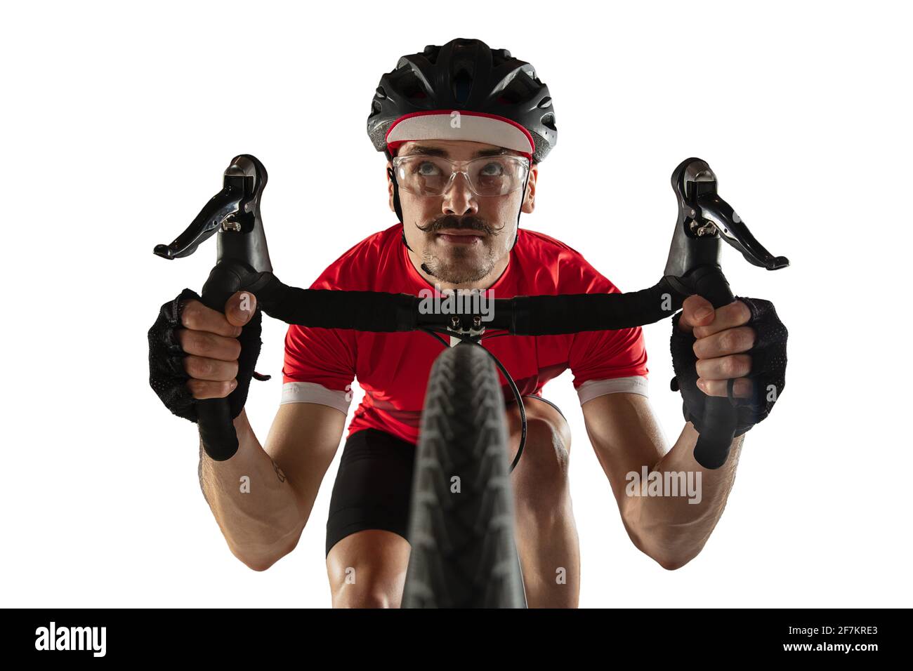 Close-up professional male cyclist on road bike isolated on white ...