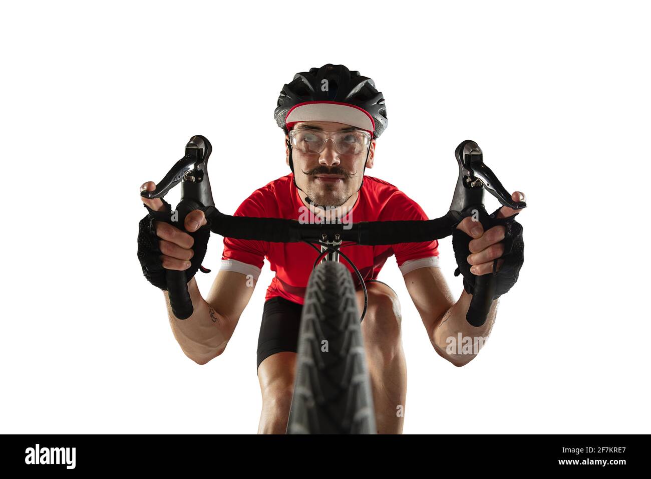 Close-up professional male cyclist on road bike isolated on white ...