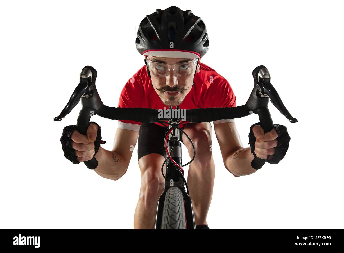 Close-up professional male cyclist on road bike isolated on white ...
