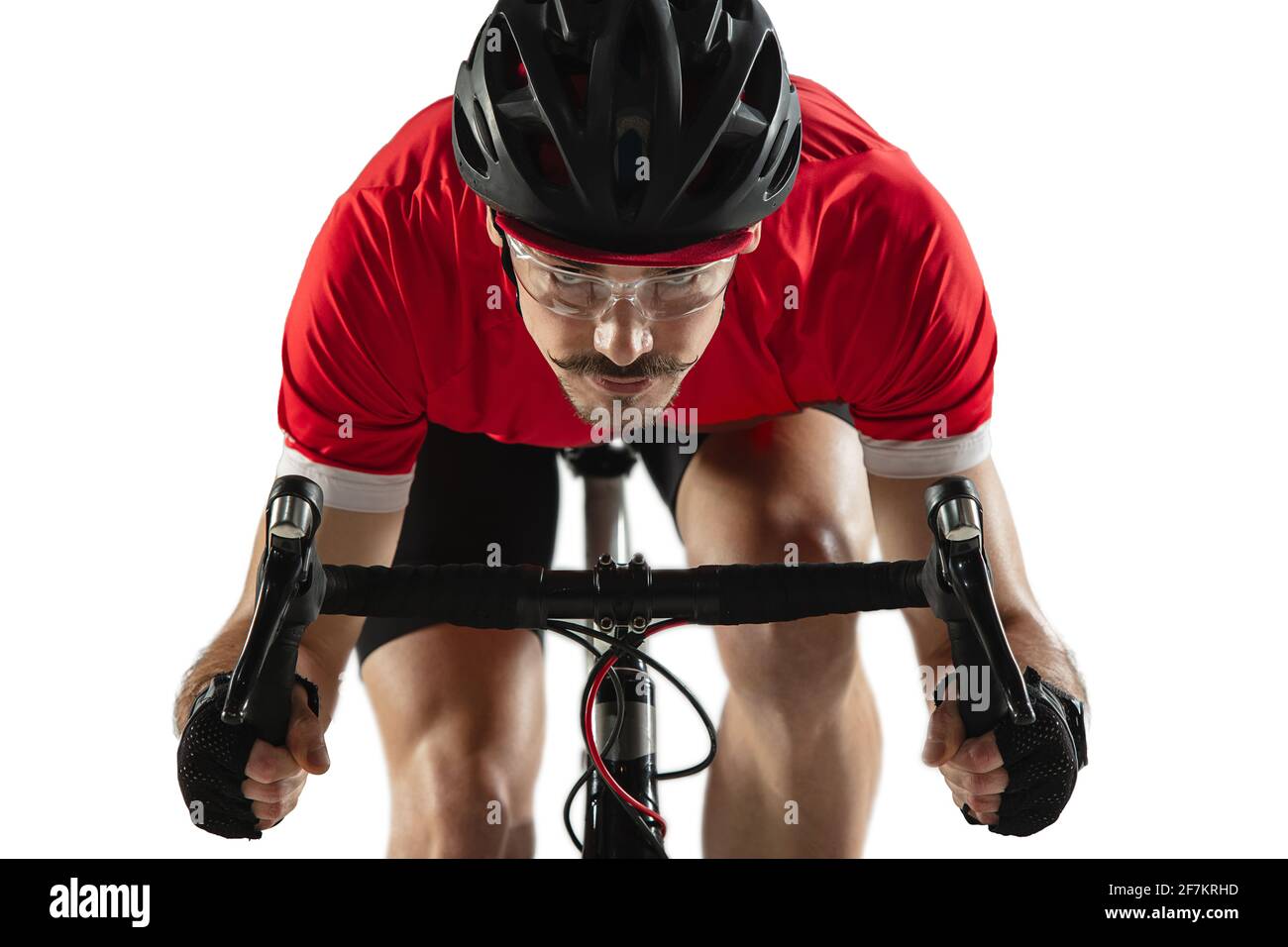 Close-up professional male cyclist on road bike isolated on white ...