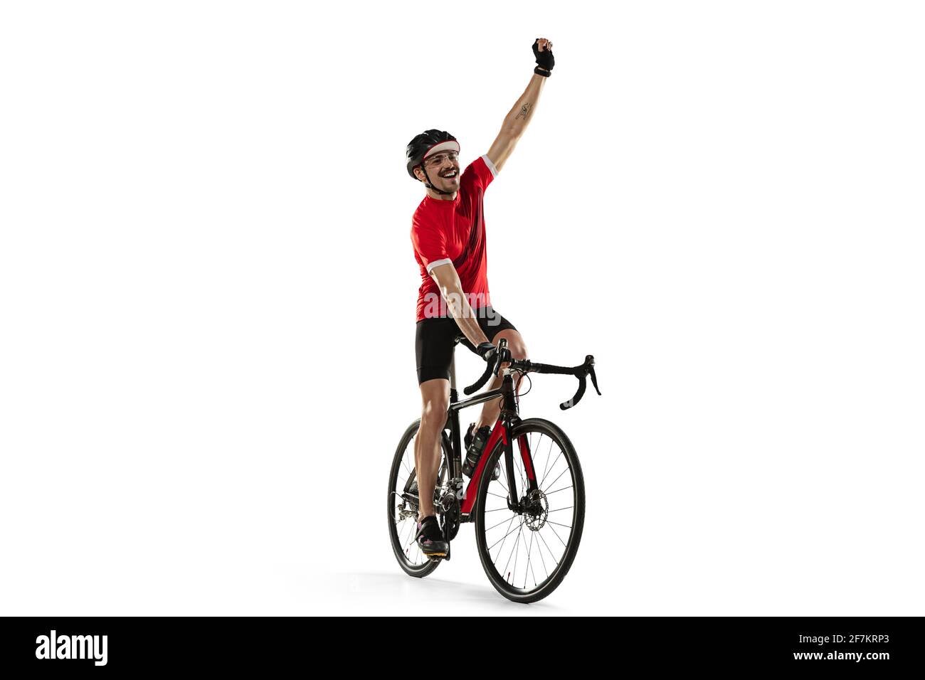 Professional male bike rider on road bike isolated over white ...