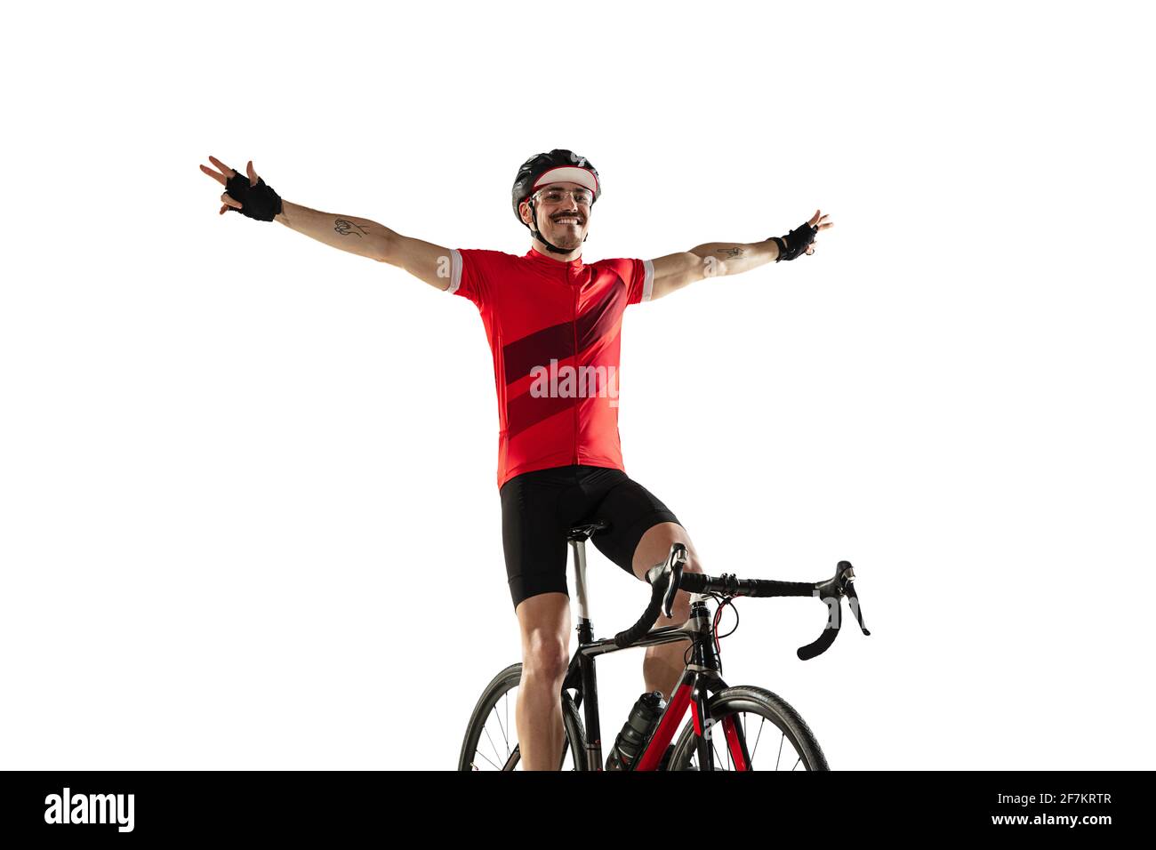Professional male bike rider on road bike isolated over white ...
